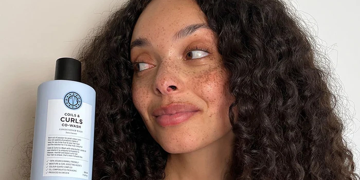 Co-washing curly hair for hydrated curls